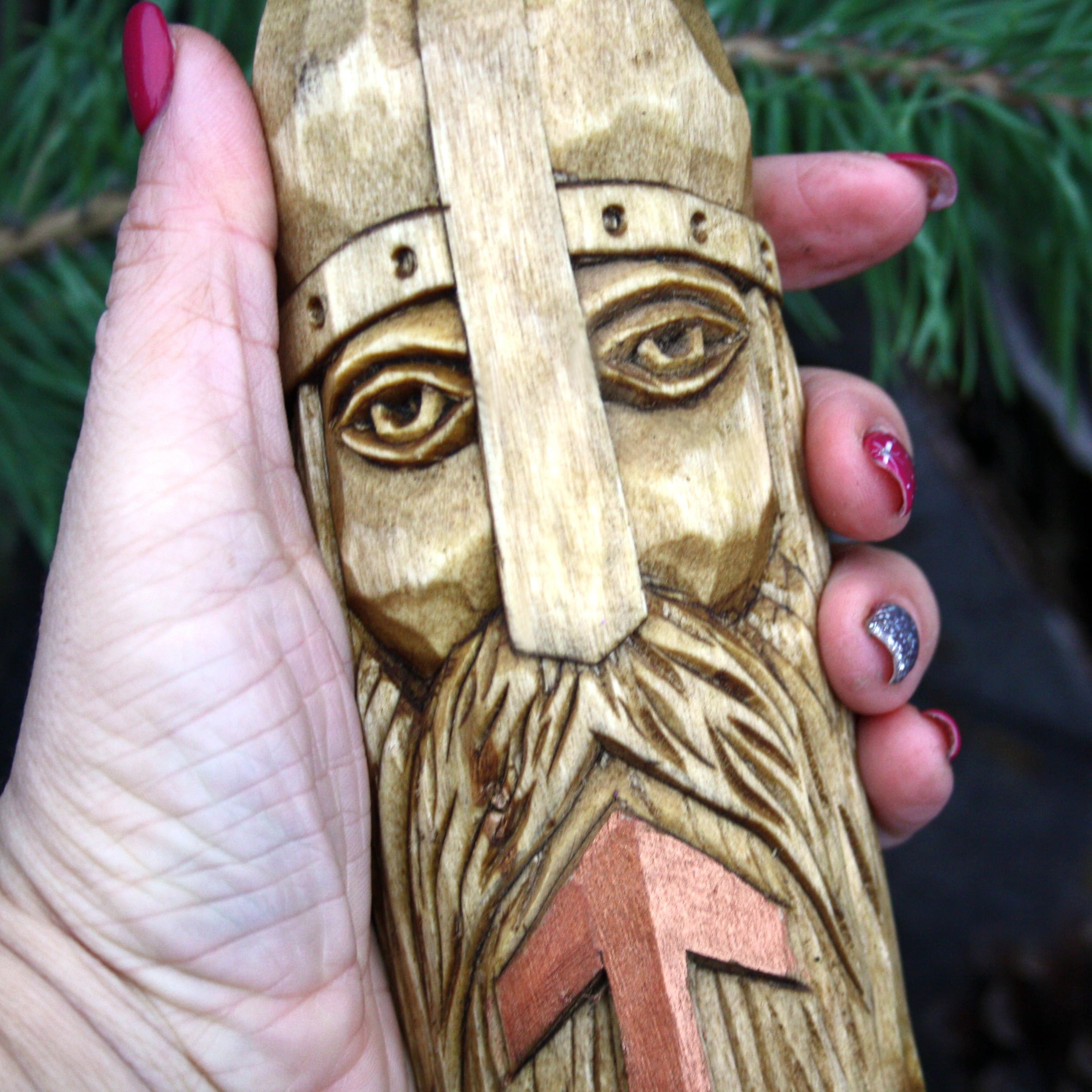 Wooden panel of Norse god TYR might showcase the brave deity