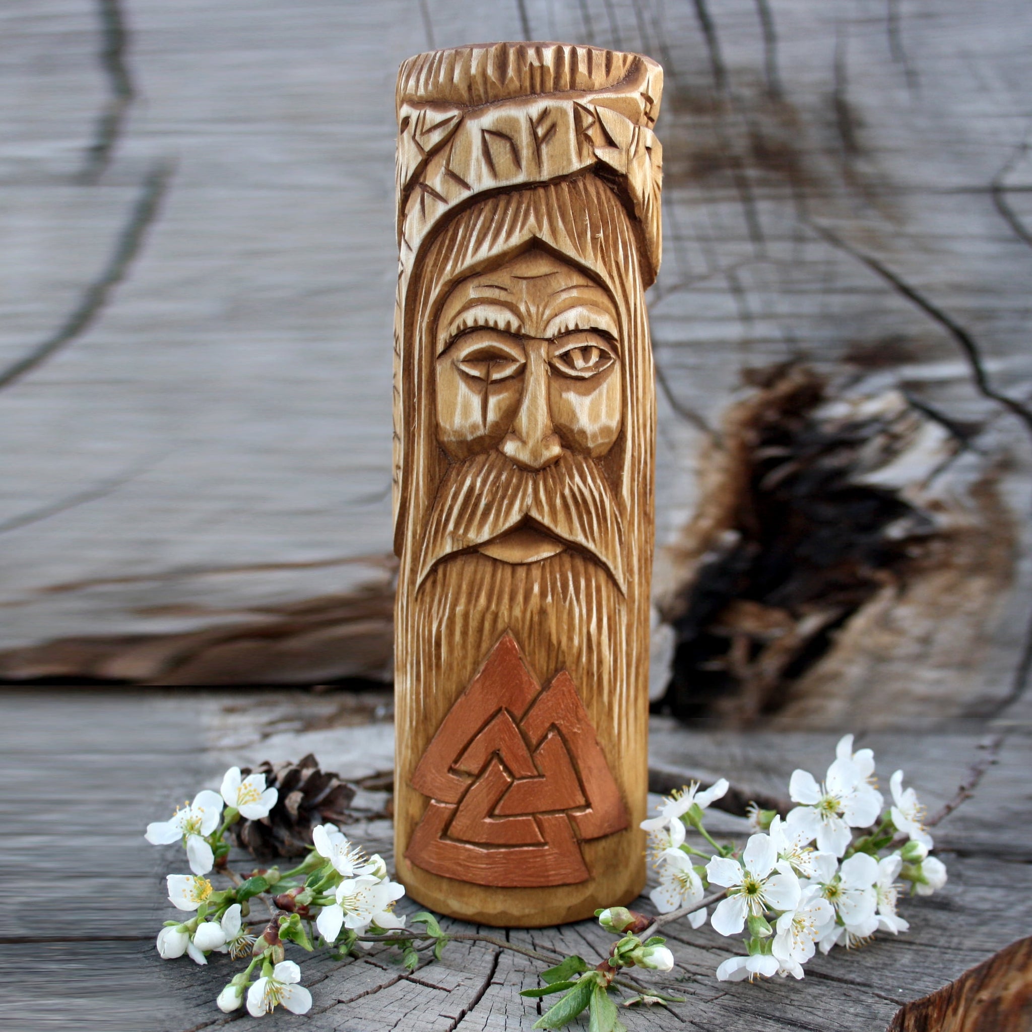 Wooden panel of Norse god ODIN with runes. God of wisdom