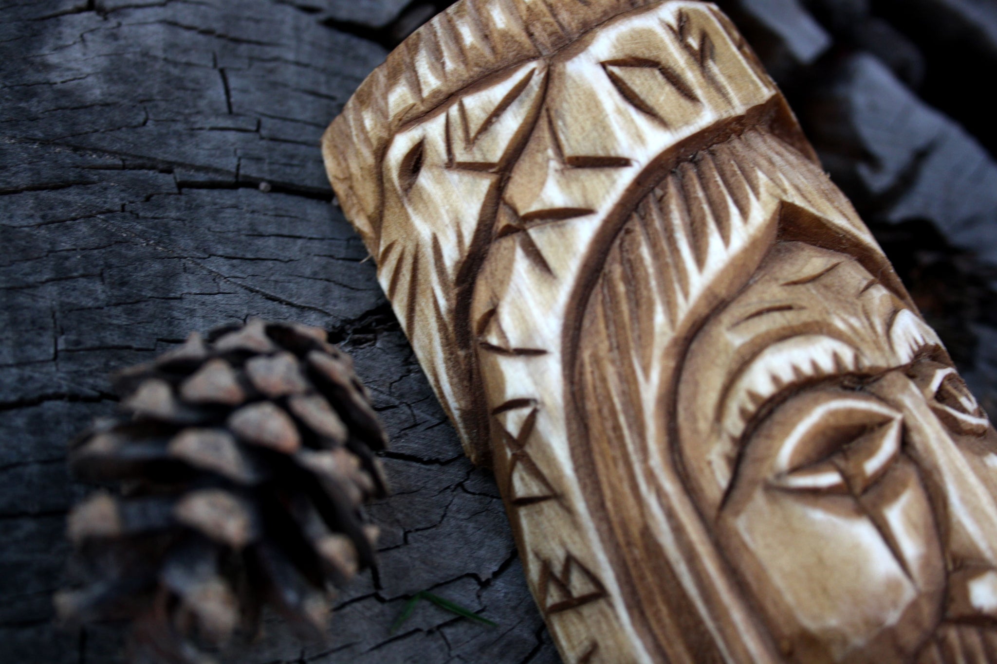 Wooden panel of Norse god ODIN with runes. God of wisdom